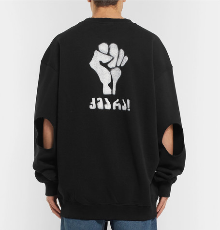New shirt with “Kmara” and “Borjghalo” symbols by Demna Gvasalia cost ...